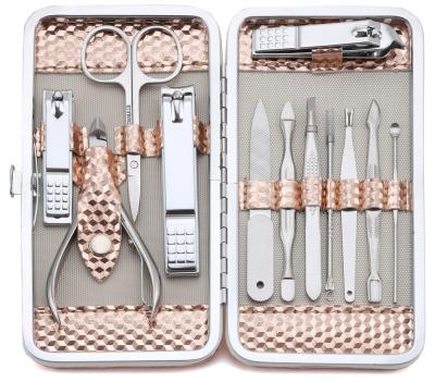 China Diamond Pattern Gold 12pcs Manicure Pedicure Set Professional Nail Grooming Set for sale
