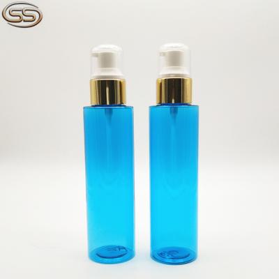 China 150ml Clear Blue Plastic Cosmetic Lotion Bottle With Golden Pump for sale