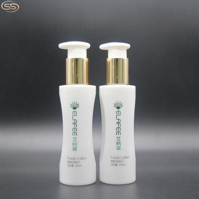 China 100ml Hot Stamping Handling Plastic Pet Bottle With Golden Lotion Pump for sale