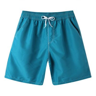 Cina Pantaloni da spiaggia da uomo a secco veloce colore solido Cinque minuti pantaloncini surf nuoto vacanza in vendita