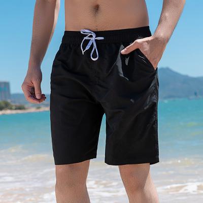 Cina Pantaloni da spiaggia da uomo a secco veloce colore solido Cinque minuti pantaloncini surf nuoto vacanza in vendita