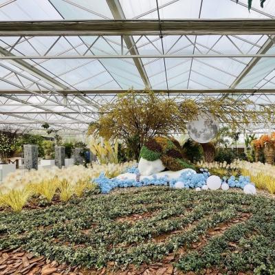 Cina Serra di vetro su richiesta personalizzata con sistema di fiori e forma del tetto personalizzata in vendita