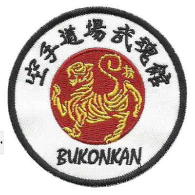 Chine Corrections brodées aux vêtements, usine de broderie de la Chine pour des corrections de broderie d'habillement, à vendre