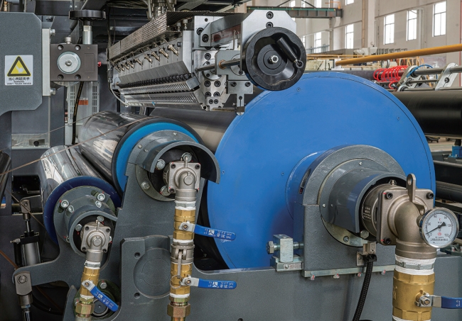 Extrusion laminating machine mechanism