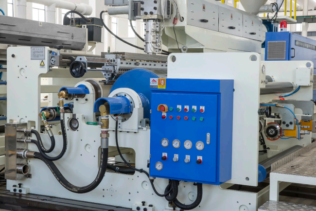 Detailed view of laminating machine mechanism