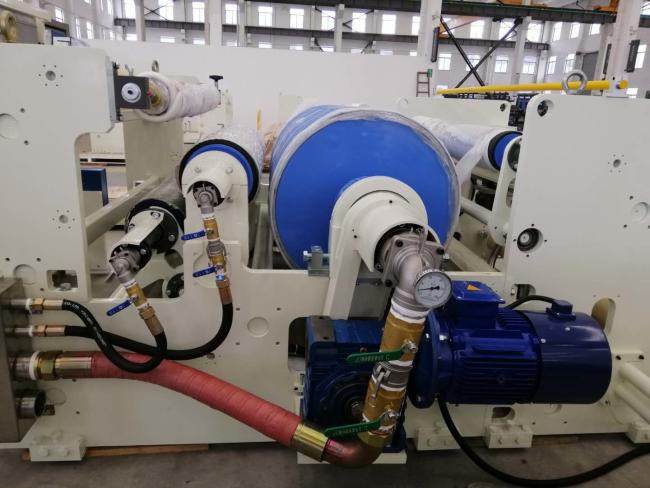 Compound machine for extrusion lamination
