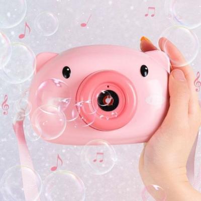 China Small Plastic Automatic Cute Pig Music Automatic Bubble Soap Maker Blowing Machine Toys for Kids Children Bubble Gun factory