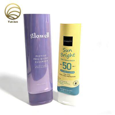 China 50ml 100ml PE empty super oval tube plastic packaging with flip top cap for suncreen lotion for sale