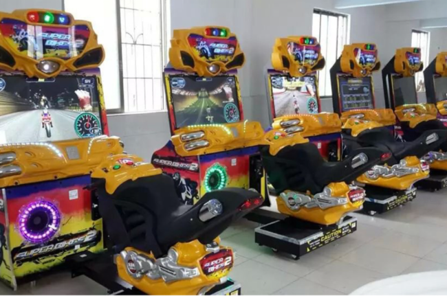 Multiple arcade machines in amusement setting