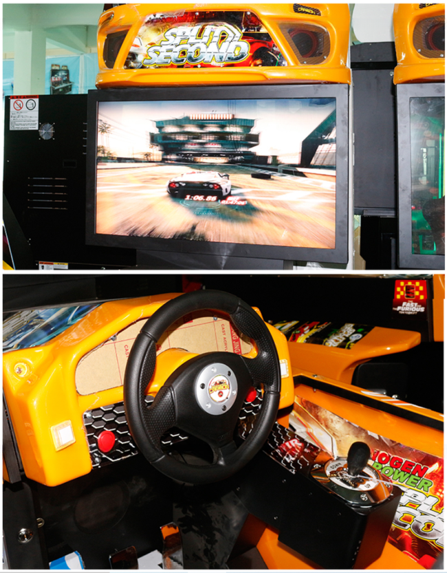 Close-up of game screen and steering wheel controls
