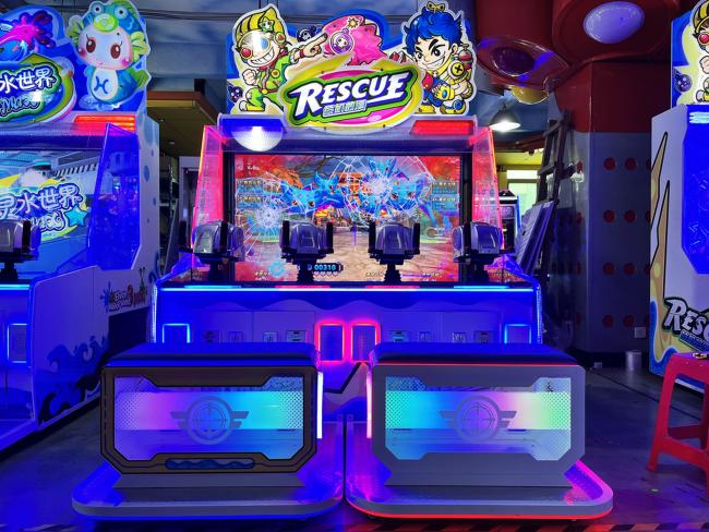 Close-up of water gun controls and player interface with buttons and joystick