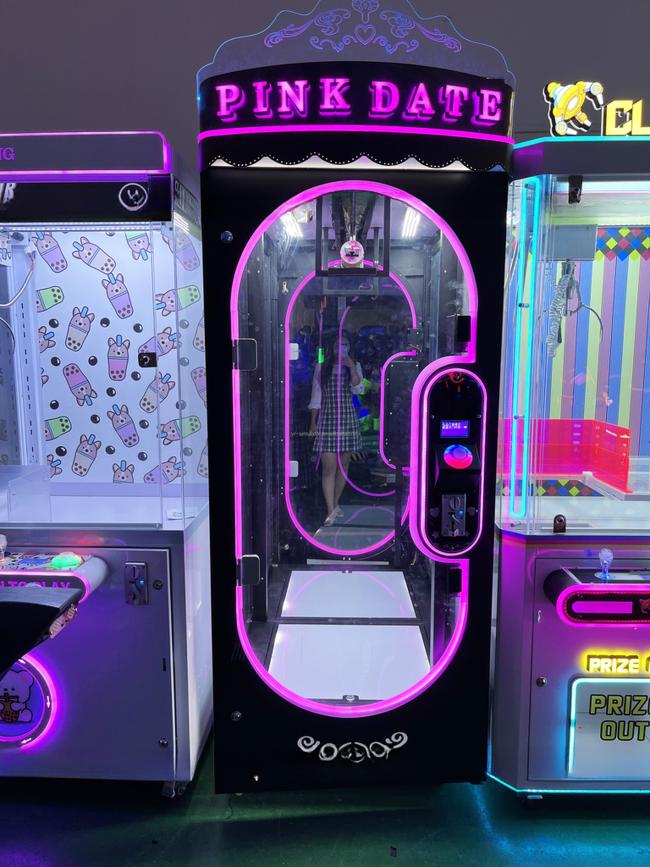 Player using the crane machine