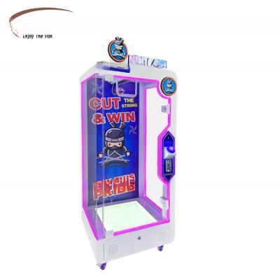 China Electric Scissors Game Machine Cutting Doll Arcade Machine OEM for sale