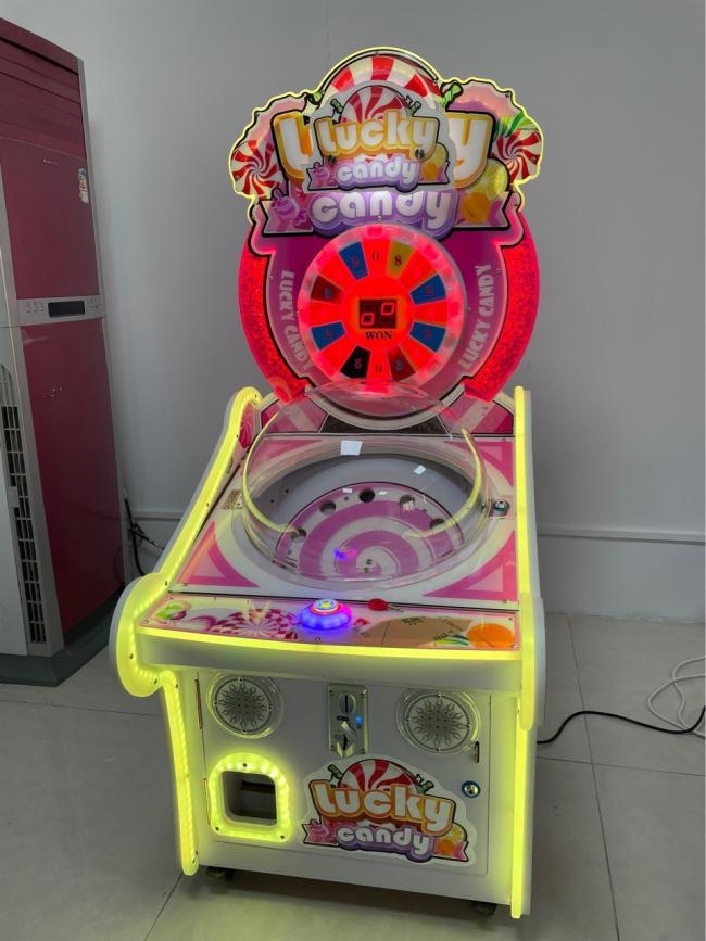Side view of Lucky Candy Prize Game Machine showing side panel details