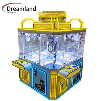 China Lucky Rainbow 4 Players Claw Game Machine offering bright lighting and smooth claw mechanics to attract players in competitive arcade environments for sale