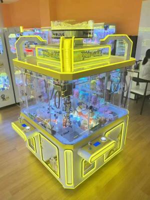 China Lucky Rainbow 4 Players Claw Game Machine offering bright lighting and smooth claw mechanics to attract players in competitive arcade environments for sale