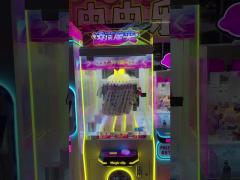 Macchina per giochi regalo a monete Spinning Clip Skill Game Poke Prize Machine