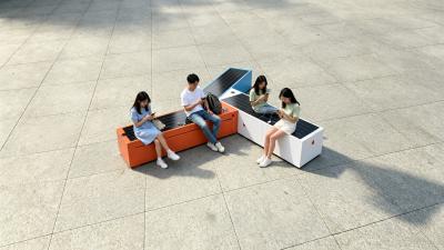 China Outdoor Park Smart Solar Benches Wireless Charging Solar Powered Park Bench With Phone Charging for sale