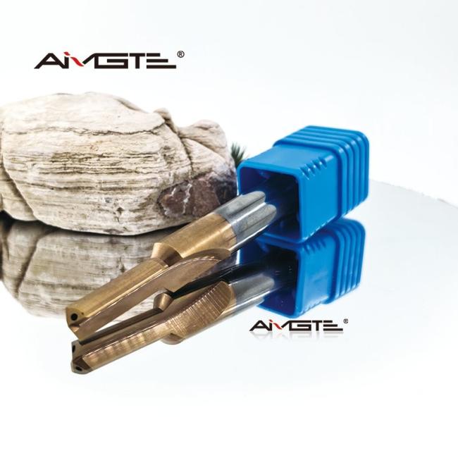 Side view of carbide step drill bit demonstrating internal coolant channels