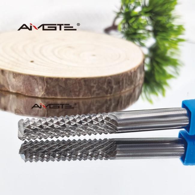 Close-up of 4mm carbide end mill showing corn tooth flute design