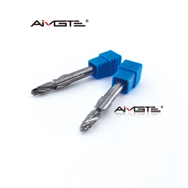 Side view of carbide step drill bit demonstrating flute design