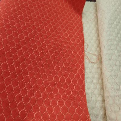China Aramid Reinforcement Fabric with Honey-comb Jacquard Pattern High Tensile Strength and Flame-Retardant Properties for sale