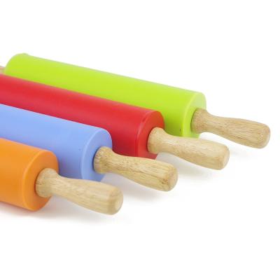 China Safety FDA Food Grade Baking Tools Silicone Rolling Pin Non-stick Surface Wooden Handle (12 inch, Blue) for sale