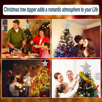 China Christmas Tree Topper Lighted Star Tree Toppers with LED Rotating Snowflake Projector Lights 3D Hollow Silver Star Snow Tree Top for sale