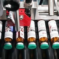 China High Efficiency Horizontal Labeling Machine 50Hz Round Bottle Labeling Machine for sale
