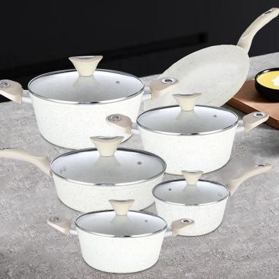 Cina Il 11 pc multifunzionali medico lapida non le pentole dell'insieme del vaso del bastone ha messo l'insieme di cottura di alluminio del vaso in vendita