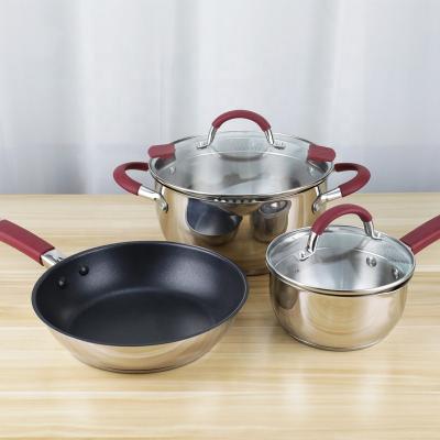China De Stok die van de douanekeuken 5pcs niet Pan Cookware Set Pot Set-Siliconehandvat het Koken Pottenreeks koken Te koop