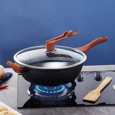 Cina Il rivestimento di vendita caldo della pietra di Maifan salta il bastone di alluminio della padella delle pentole non che frigge nel grasso bollente Pan With Lid in vendita