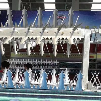 China Strong Deterrent To Intruders Practical Metal Stainless Steel Wall Anti Climb Design Modern Spike Fences for sale