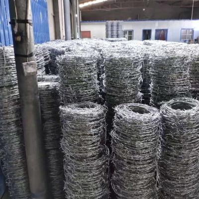 China Electro Galvanized Barbed Wire Price Per Meter Philippines Barbed Wire Installation Brackets Packaging for sale