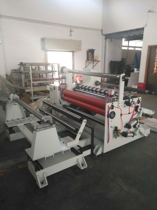 Paper roll slitting and rewinding machine