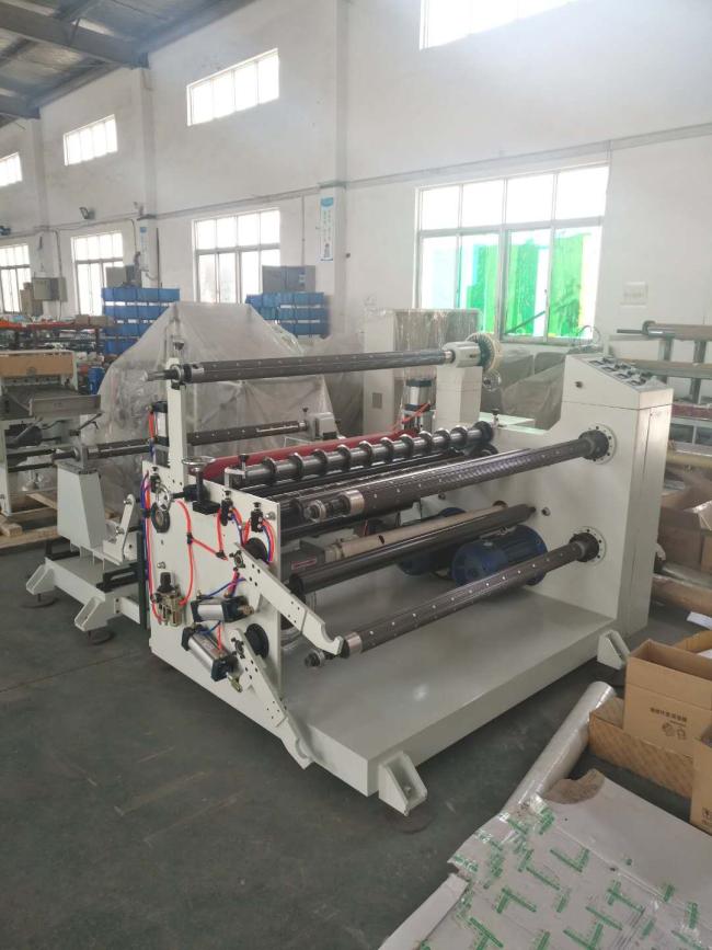 Paper roll slitting and rewinding machine