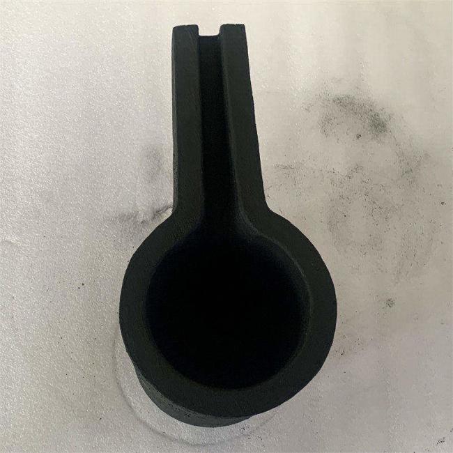 Silicon carbide graphite crucible with pouring nozzle - close-up of nozzle