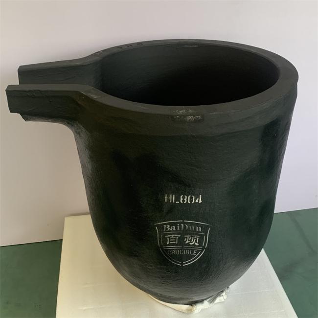 Silicon carbide graphite crucible with pouring nozzle - front view