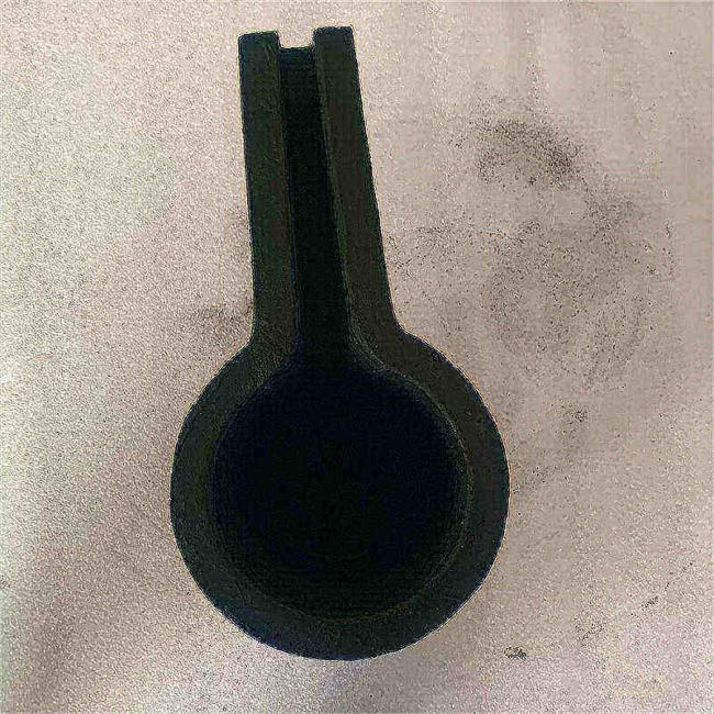 Heat resistant SiC graphite crucible with pouring nozzle - close-up of nozzle