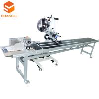 China Automatic Paging Labeling Machine 300dpi 30-80pcs/min for Flat Surface Labeling for sale
