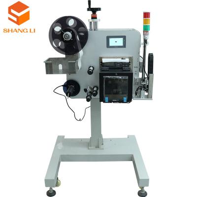 China Thermische papierrol-rewind-druk- en etiketteringsmachine met ZEBRA ZE511 printer label applicator Te koop