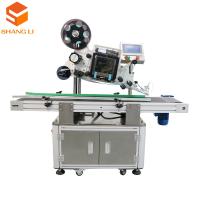 China Automatic Flat Sticker Labeling Machine for Plastic Bags 300dpi 80pcs/min for sale
