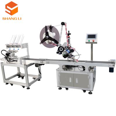 Cina Cartoni Tipo di imballaggio Applicatore di etichette automatico per cartoncini 950x950x1550mm in vendita
