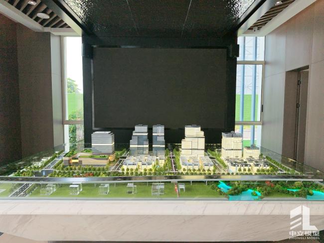 Custom architectural scale model showing urban landscape with buildings and greenery