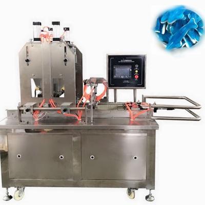 China Máquina de depósito de goma de frambuesa de plátano de acero inoxidable para hacer caramelos rápidos con jalea en venta