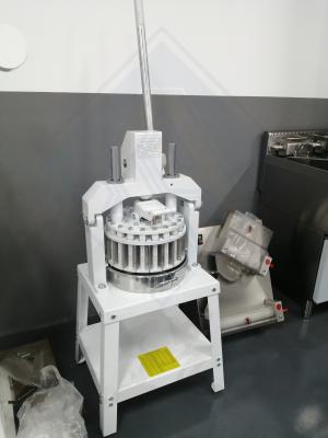 China Divididor de masa Máquina manual para dividir y redondear la masa con agua como materia prima en venta