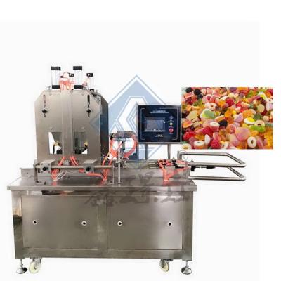 China Automatic Lollipop Toffee Candy Making Machine from Shanghai Gummy Bear Candy Factor for sale