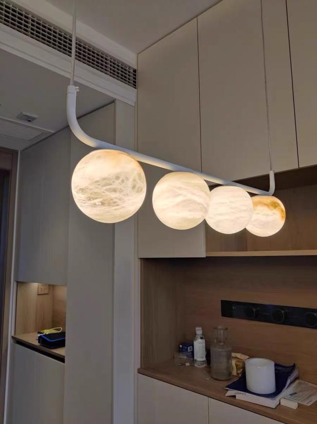 Chandelier illuminating dining area