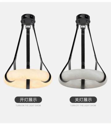 Cina Luce di lusso di pelle lampadario cerchio di marmo cucina soggiorno arte creativa alabastro luce lampada appesa in vendita