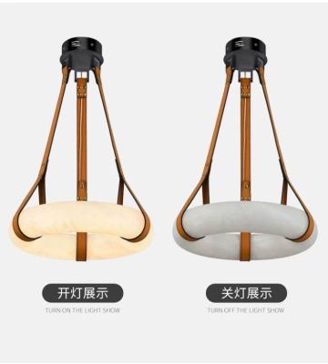 Cina Luce di lusso di pelle lampadario cerchio di marmo cucina soggiorno arte creativa alabastro luce lampada appesa in vendita
